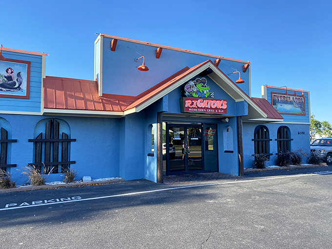 The vibrant turquoise exterior of RJ Gator's stands out like a peacock at a chicken convention, promising Florida flavors with every shade of blue.