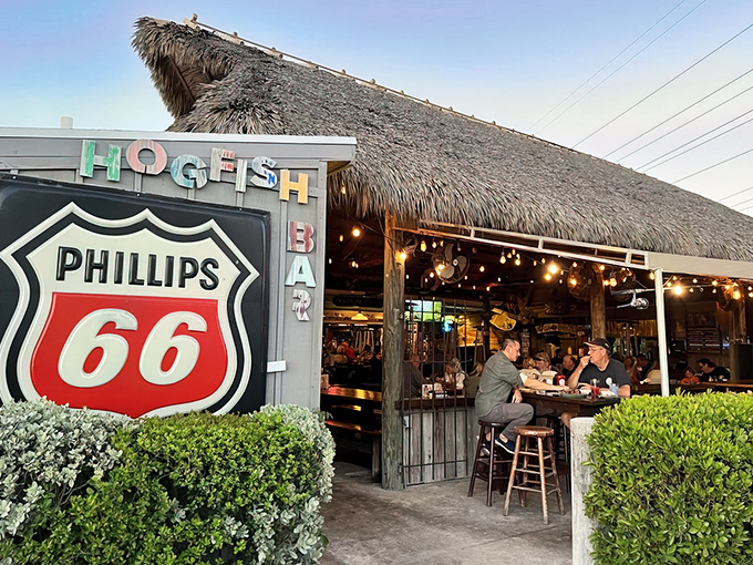 That thatched roof and Phillips 66 sign combo screams "authentic Florida Keys" louder than any tourist brochure ever could.