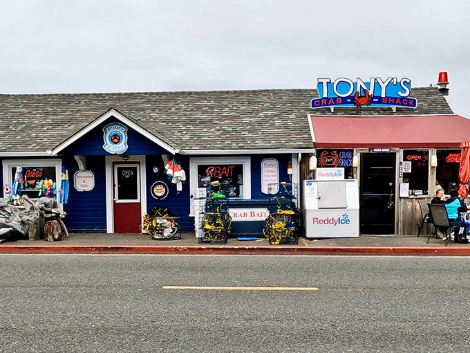 Sunset magic at Tony's Crab Shack, where the weathered blue exterior and quirky nautical decor hint at the seafood treasures waiting inside.