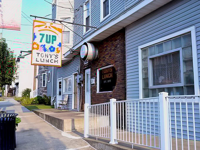The vintage 7UP sign beckons like a neon lighthouse, guiding hungry travelers to Tony's Lunch in Girardville. Some landmarks need no explanation. 
