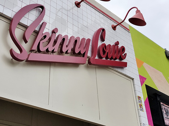 The unassuming white-tiled exterior of Skinny Louie belies the culinary magic happening inside. Miami's best-kept burger secret hides in plain sight.