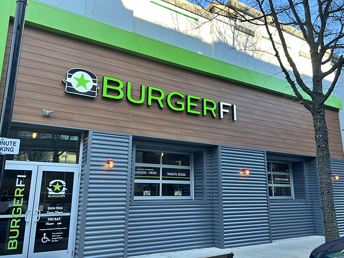 BurgerFi's vibrant green facade stands out like a beacon of burger hope in Gaithersburg. The modern wood paneling says "we're not your average fast food joint."