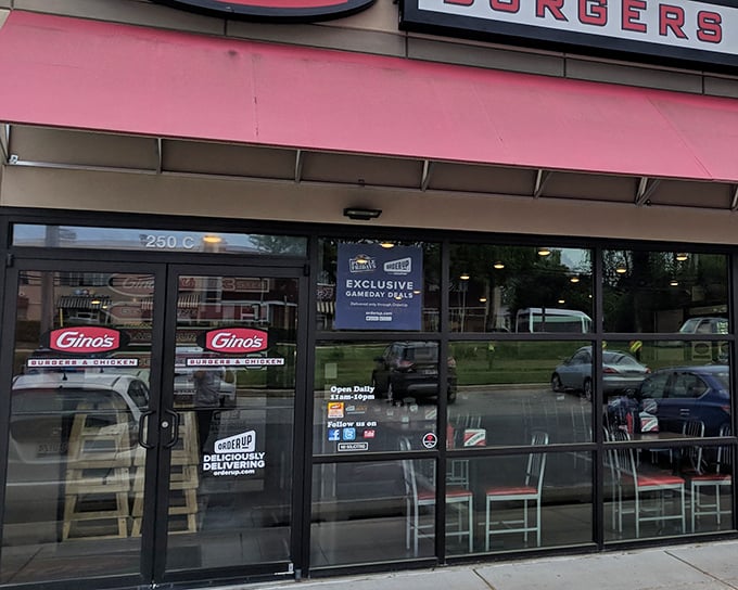 The beacon of burger bliss! Gino's bright red awning and outdoor seating area beckon hungry Marylanders like a culinary lighthouse on a sea of mediocre fast food.