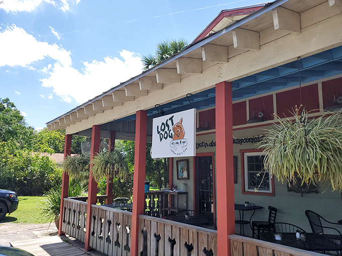 The cheerful yellow exterior with red trim practically shouts "happiness served here!" Palm trees and that iconic wooden fence welcome you to breakfast paradise.