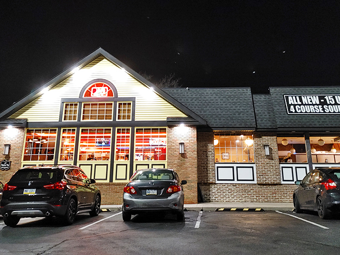 The yellow and brick facade of Limerick Diner stands like a beacon of breakfast hope against the Pennsylvania sky, promising culinary comfort to all who enter.