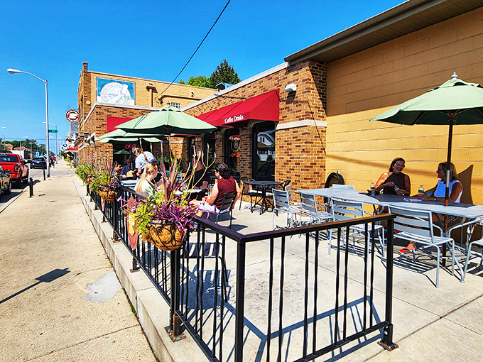 The red awnings beckon like dairy sirens, promising cheese treasures within this unassuming brick building that's become a Wisconsin institution.