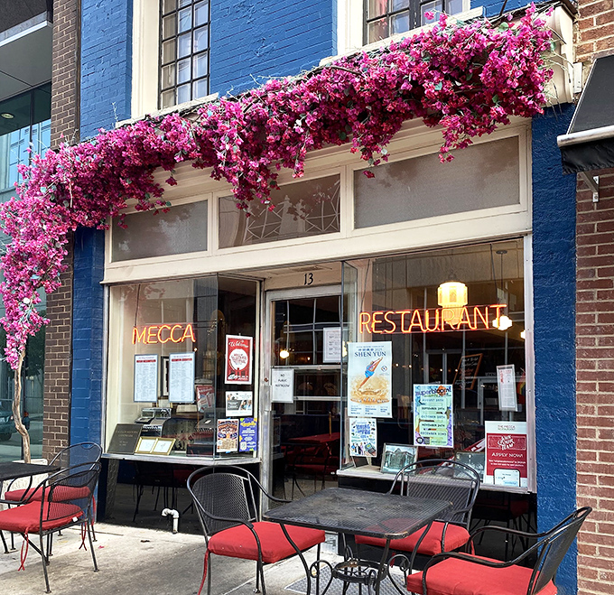 The bougainvillea-framed entrance to Mecca Restaurant isn't just Instagram-worthy&mdash;it's like Mother Nature herself decided this place deserved a special announcement. 