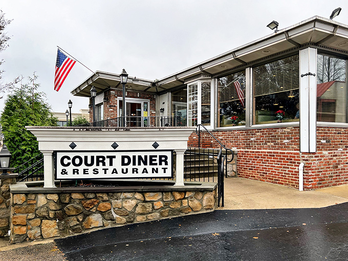 The classic brick and stone exterior of Court Diner stands like a beacon of comfort food promise in Media, Pennsylvania.