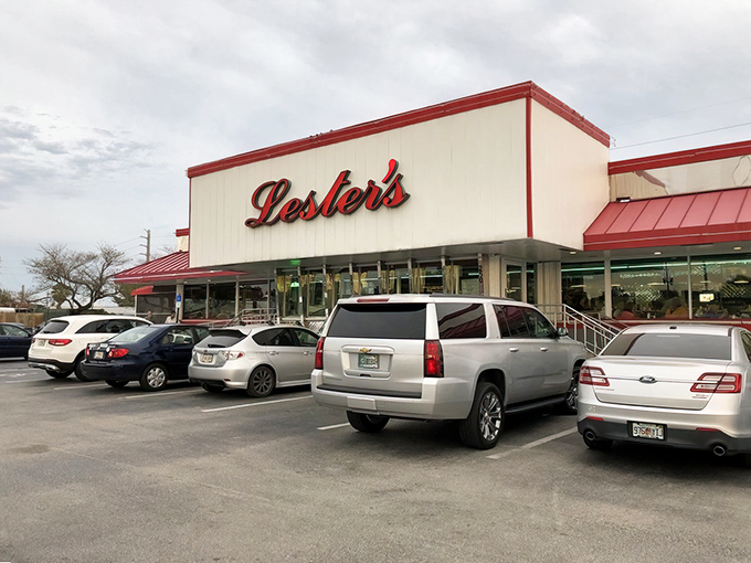Lester's iconic red and white exterior stands like a beacon of hope for the hungry, promising comfort food salvation inside.