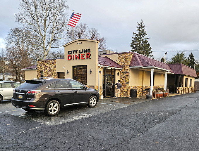 Stone facade, American flag, and that iconic red sign &ndash; City Line Diner stands like a delicious fortress of comfort food in Harrisburg.