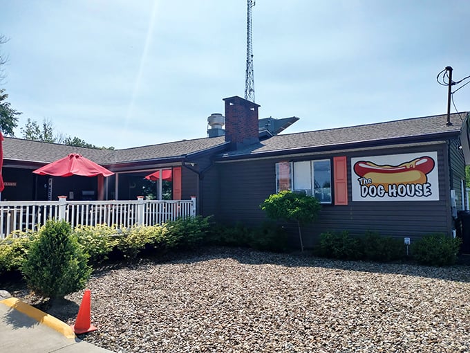 The Cleveland Dog House's unassuming exterior hides a temple of hot dog worship. Those red umbrellas on the patio aren't just for show&mdash;they're beacons calling hungry Ohioans home.