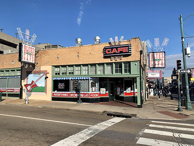The iconic brick facade of Blues City Cafe stands as a beacon on Beale Street, promising Memphis magic in every bite.