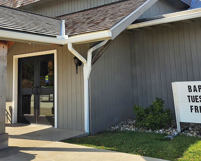 The charming exterior of Sauder Village welcomes visitors with classic white buildings and brick pathways&mdash;rural Ohio's version of a time machine.