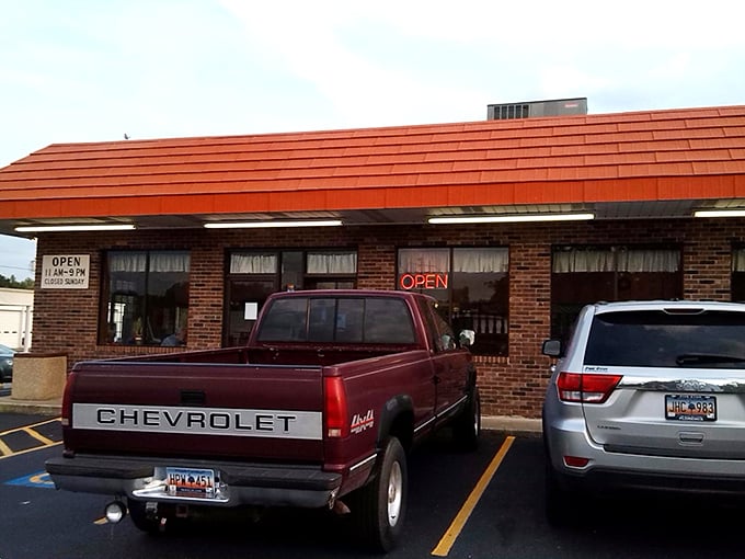 That iconic red roof and brick exterior isn't trying to be fancy&mdash;and that's precisely its charm. A beacon for hungry travelers since long before Instagram food pics were a thing.