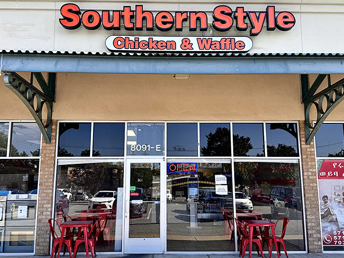 The bright red sign of Southern Style Chicken & Waffle stands out like a culinary lighthouse, promising comfort food salvation to hungry Springfield travelers.