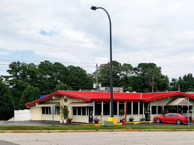 That iconic red roof isn't just eye-catching—it's a beacon calling to seafood lovers across Raleigh like a maritime lighthouse for hungry landlubbers.