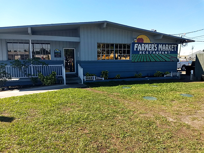 The blue exterior of Farmer's Market Restaurant stands like a beacon of comfort food hope in Fort Myers. No fancy frills, just honest cooking awaits.