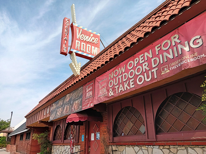 That neon sign isn't just advertising – it's a time portal to an era when cocktails were strong and steaks were king.
