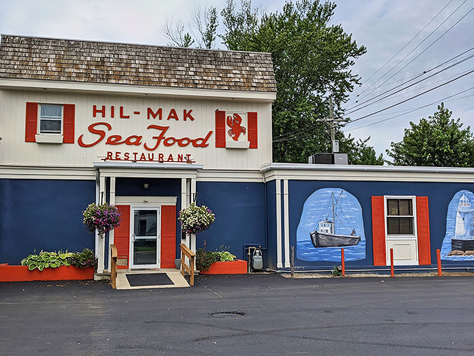 The blue and red exterior of Hil-Mak beckons like a nautical mirage in Ohio, complete with charming fishing boat mural that whispers, "Yes, we know our seafood."