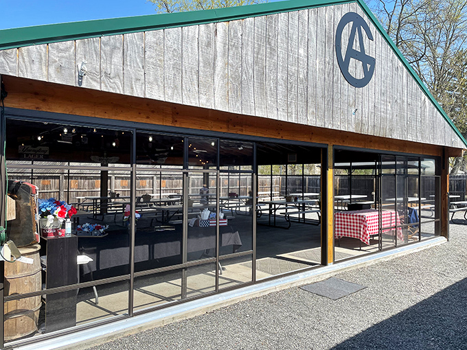 The rustic wooden exterior with that iconic "A" logo promises what every great BBQ joint should: no frills, just honest-to-goodness smoky deliciousness waiting inside.