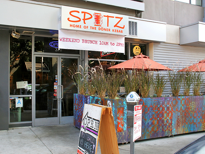 Spitz announces itself with vibrant confidence &ndash; colorful planters, coral umbrellas, and a promise of d&ouml;ner kebabs that'll make your taste buds stand at attention.