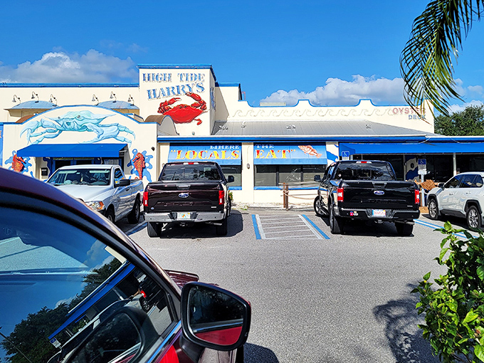 The giant blue crab guarding High Tide Harry's entrance isn't just decoration&mdash;it's a promise of the oceanic treasures waiting inside.