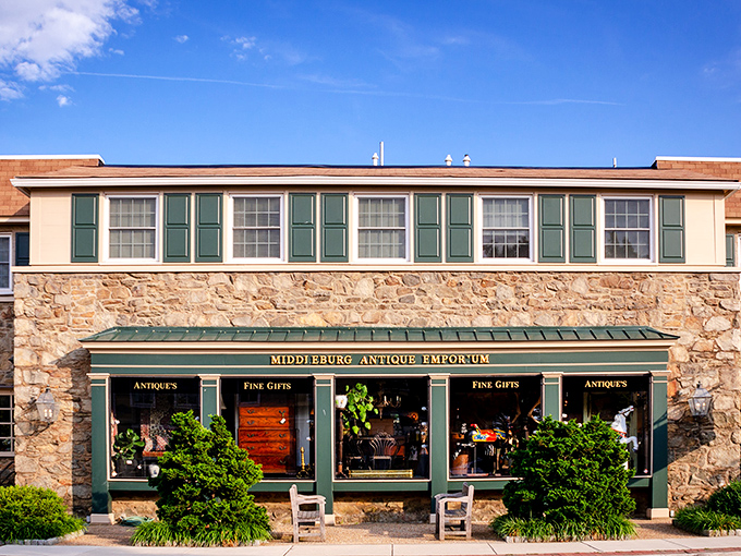 The stone facade of Middleburg Antique Emporium stands like a time portal in Virginia horse country, promising treasures behind those gleaming green-trimmed windows.