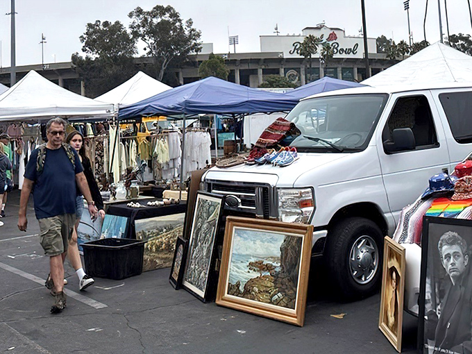 Treasure hunting paradise under the California sun. White tents stretch across the asphalt, offering everything from vintage frames to glassware and colorful textiles.
