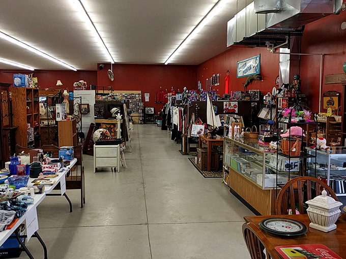 A treasure hunter's paradise awaits! This colorful corner booth showcases everything from dollhouses to wicker chairs, each item whispering stories of its past life.