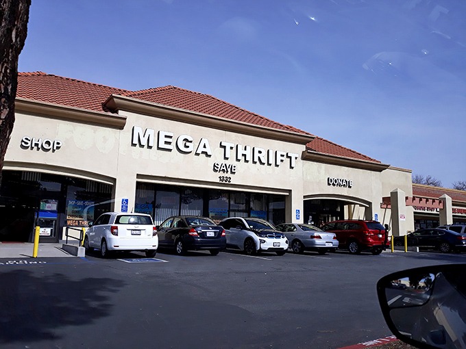 The unassuming exterior of Mega Thrift beckons with its simple promise: Shop, Save, Donate. Behind those doors, treasure awaits.