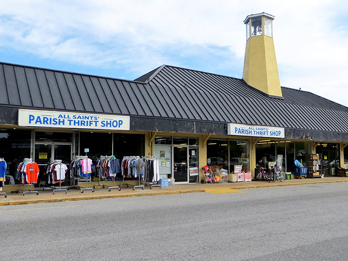 The iconic yellow bell tower stands like a lighthouse for bargain hunters, beckoning shoppers to this treasure-filled haven where fashion meets frugality.