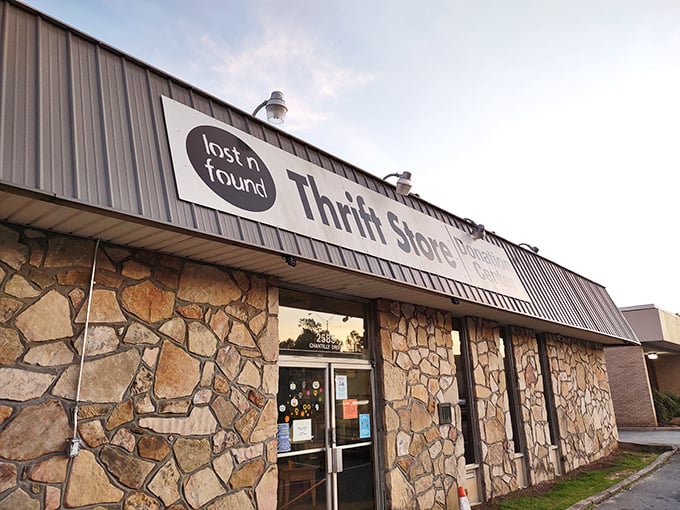 The stone facade of Lost-N-Found Thrift Store stands like a treasure chest waiting to be opened, promising bargains that'll make your wallet do a happy dance.
