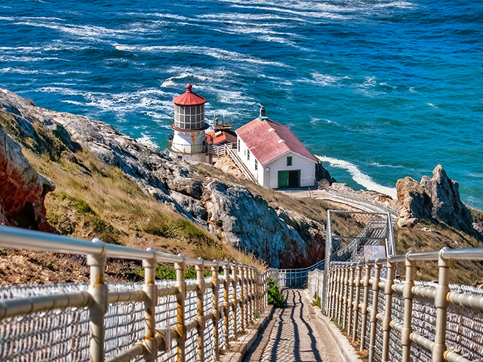 Twilight magic transforms Point Reyes Lighthouse into a beacon of dreams, where purple skies meet golden light in California's most dramatic sunset show.