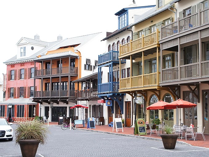 The iconic clock tower building stands as Rosemary Beach's architectural crown jewel, where bicycles outnumber cars and balconies beckon with Gulf views.