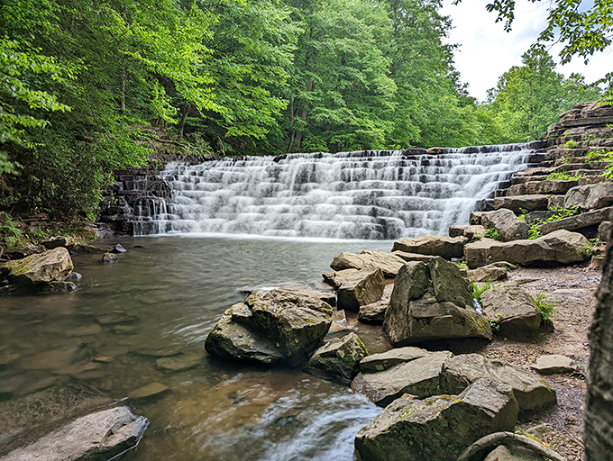 Jones Mill Run Dam creates nature's perfect staircase, where water cascades down in hypnotic rhythm. Mother Nature showing off her architectural skills.