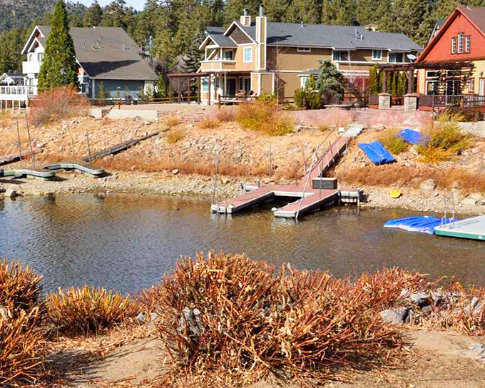 Lakefront living at its finest, where private docks and autumn-kissed shorelines create the perfect backdrop for your "I'm definitely buying a vacation home" daydreams.