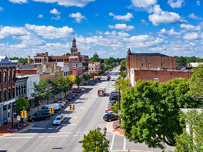 Sunset paints Norwalk's Main Street in cinematic hues that would make Wes Anderson jealous. Historic facades stand proudly against a sky on fire.