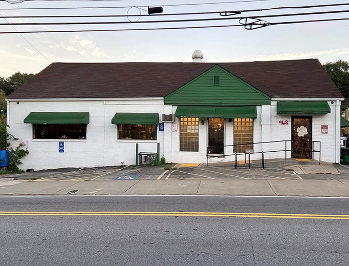 The green awnings and white brick exterior of Home grown GA beckon like an old friend saying, "Come on in, the biscuits are waiting."