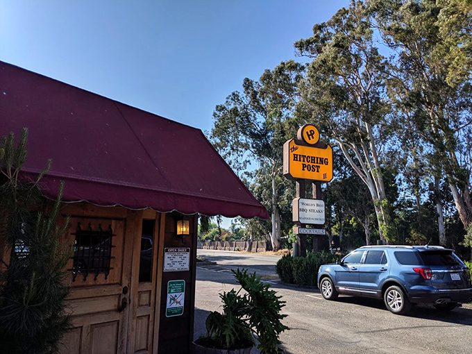 The burgundy-roofed roadside treasure that's been saving hungry travelers from fast food regret for decades. California's eucalyptus trees stand guard over this steak sanctuary.