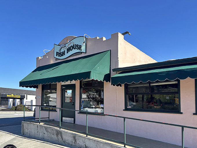 The unassuming pink exterior with green awnings might fool you, but locals know&mdash;culinary treasures often hide in plain sight.