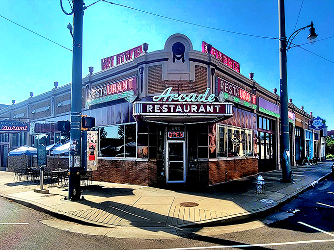 That mint green script against classic red tile isn't just a sign&mdash;it's a time machine disguised as Memphis's oldest caf&eacute;. Some neon just speaks to your soul.