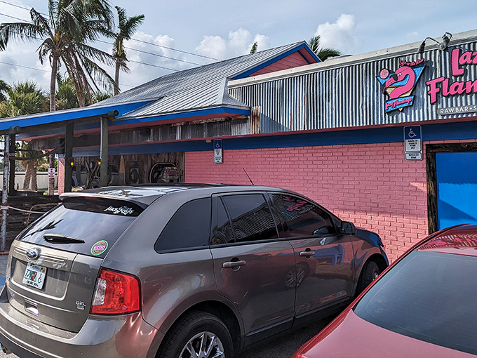 The pink and blue exterior of The Lazy Flamingo stands out like a flamingo at a penguin convention&mdash;Florida casual at its finest.