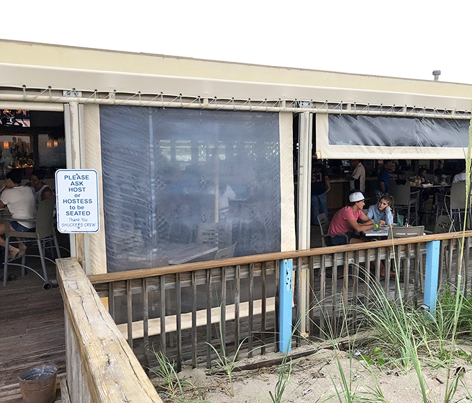 The beachside entrance to Shuckers welcomes diners with coastal charm and the promise of ocean breezes &ndash; Florida dining as it should be.