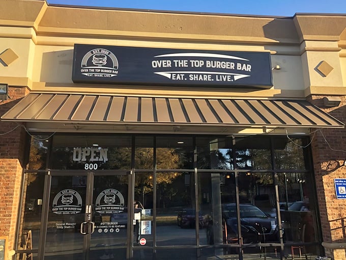 The unassuming storefront of Over The Top Burger Bar beckons like a siren song to burger enthusiasts. Behind those doors, culinary magic awaits the brave and hungry.