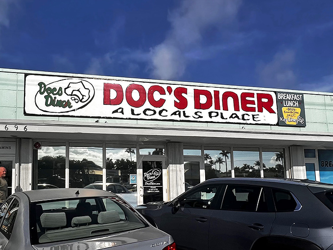 Where "A Local's Place" isn't just a slogan but a promise. Doc's Diner stands proudly against that brilliant Florida sky, beckoning hungry travelers with honest food and zero pretension.