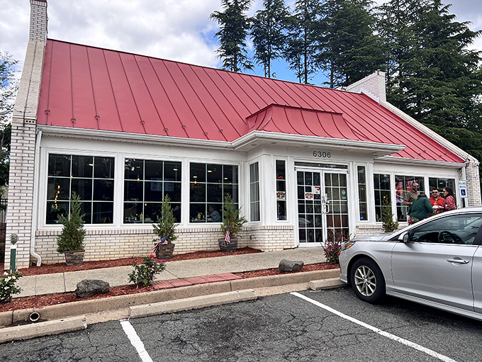 The iconic red roof of Barnside Diner beckons hungry travelers like a lighthouse guiding ships to breakfast harbor. Classic Americana at its finest.