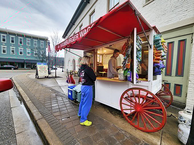 The iconic red and white Hamburger Wagon stands proudly on Miamisburg's Main Street, a culinary time machine that's been serving sliders since Woodrow Wilson was president. 