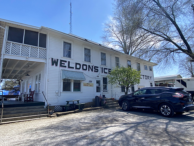 The white clapboard building stands like a time capsule, complete with porch seating where ice cream and conversation flow in equal measure.