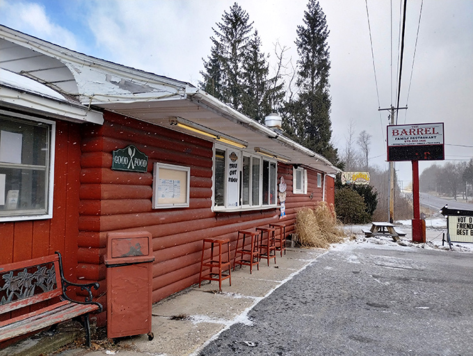 The little red log cabin that could! This unassuming exterior in Spring Brook Township hides breakfast magic that locals have treasured for generations.