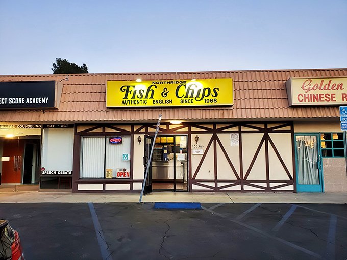 The bright yellow sign of Northridge Fish & Chips stands out like a beacon of fried goodness against the Tudor-style facade. No-nonsense British comfort food awaits inside.